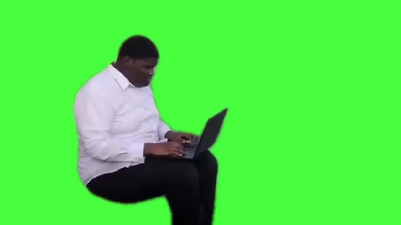 Man working on laptop meme green screen - Video Download MP4